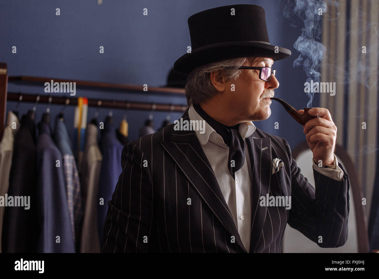 Portrait of posh mature gentleman visiting a tailor's shop Stock Photo ...