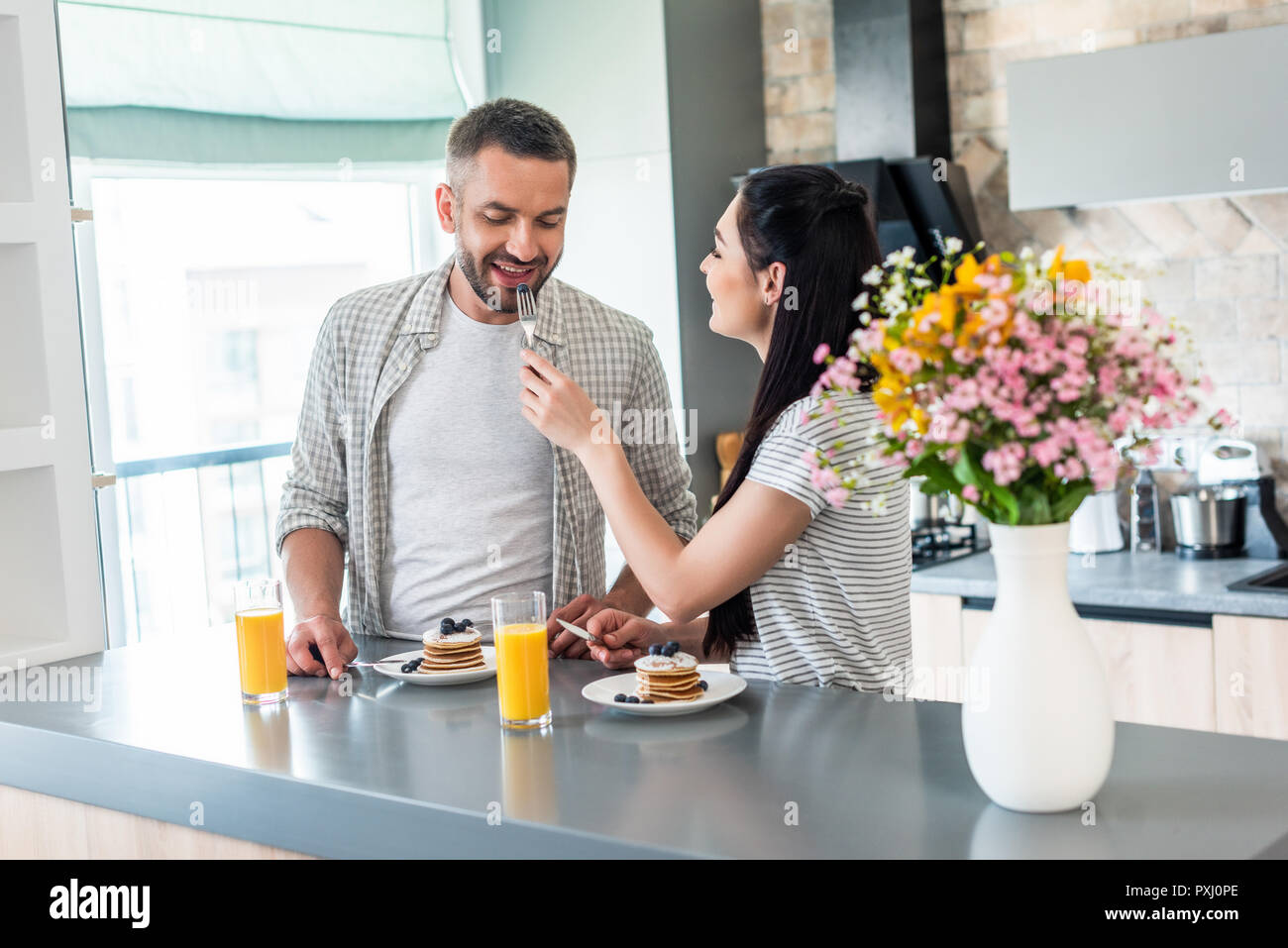 Married couple having breakfast hi-res stock photography and images - Alamy