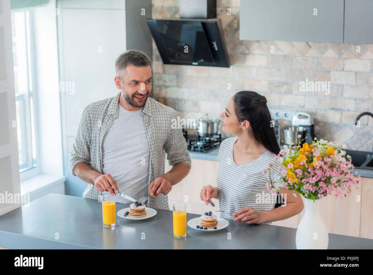 Married couple having breakfast hi-res stock photography and images - Alamy