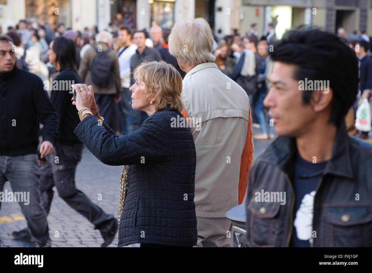 Crowd city people cell phones hi-res stock photography and images - Alamy