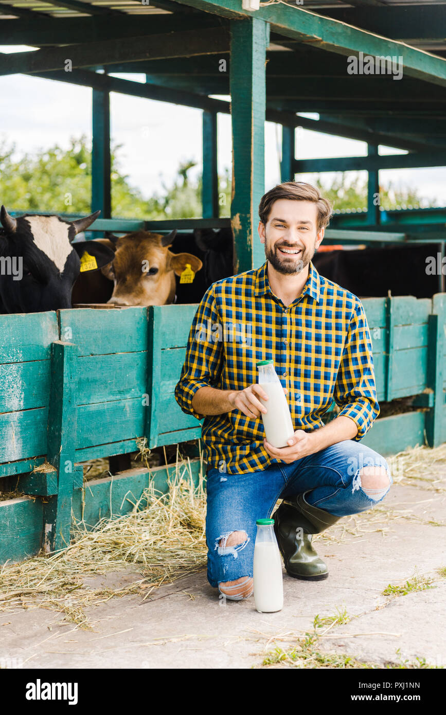Squatting farmer hi-res stock photography and images - Alamy