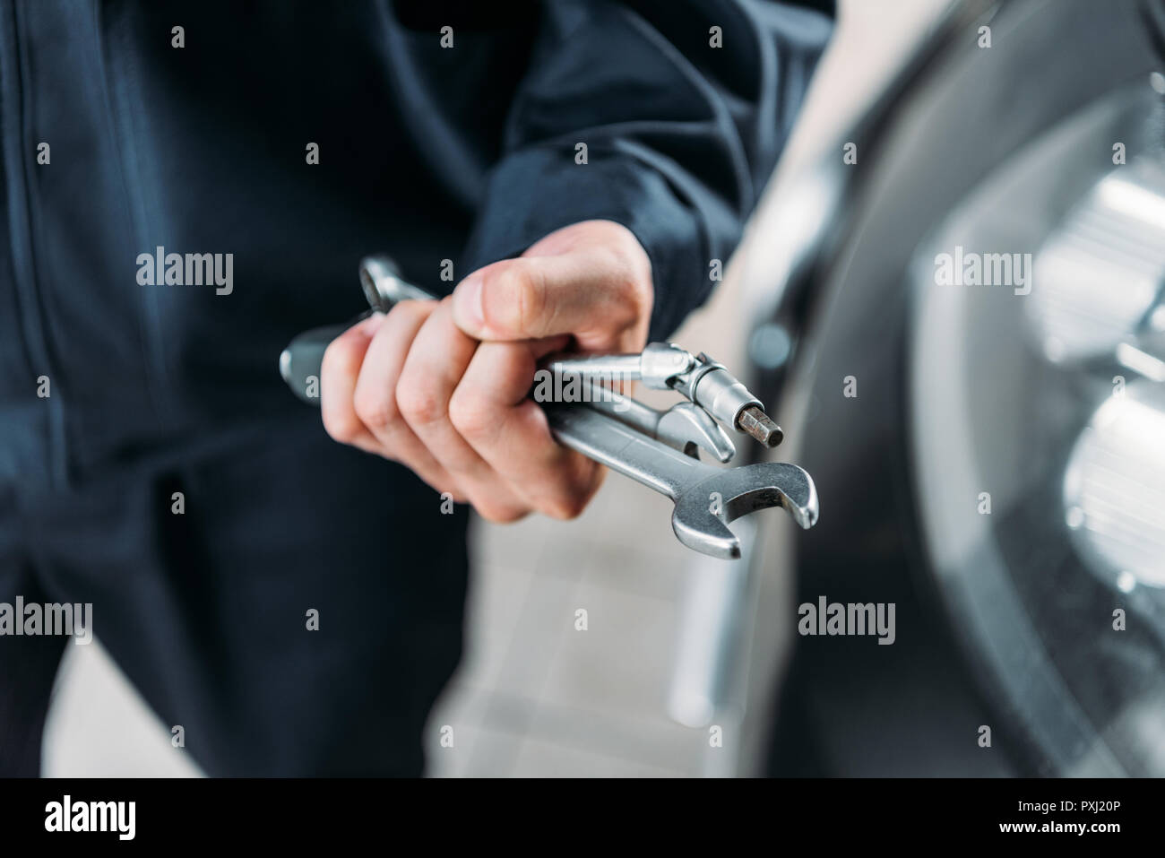 Cropped view workman holding hi-res stock photography and images - Alamy