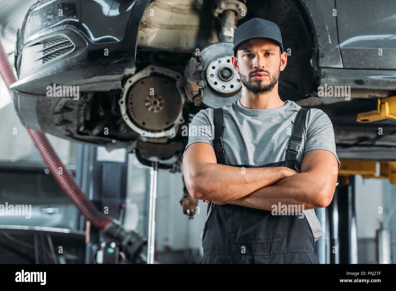 Mechanic posing hi-res stock photography and images - Alamy