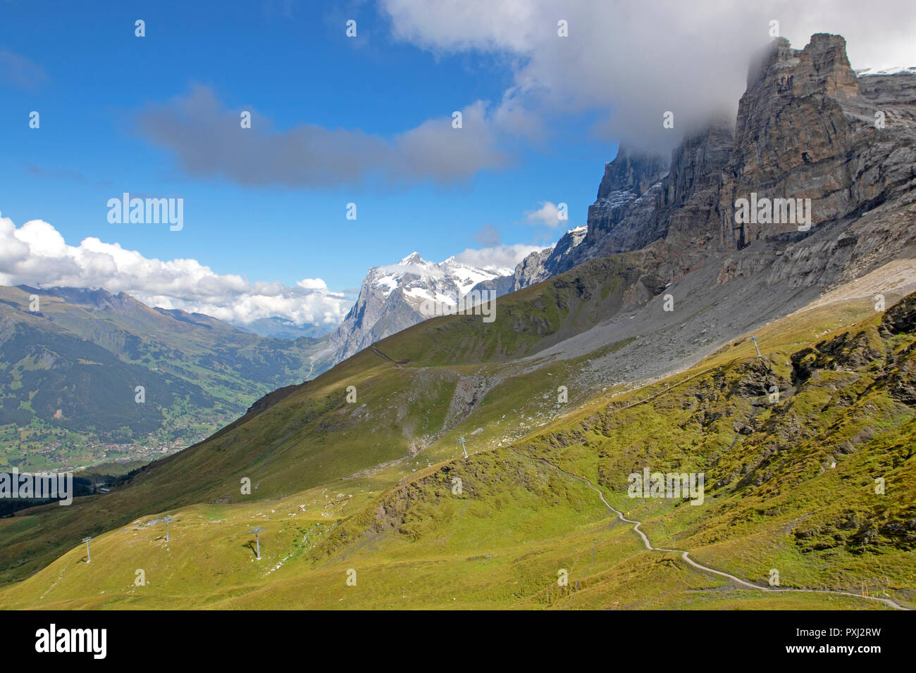 The Eiger Trail running beneath the North Face of the Eiger Stock Photo ...