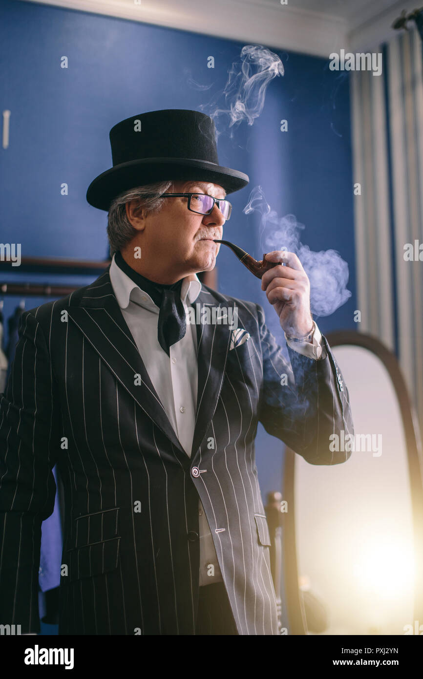 Portrait of posh mature gentleman visiting a tailor's shop Stock Photo ...
