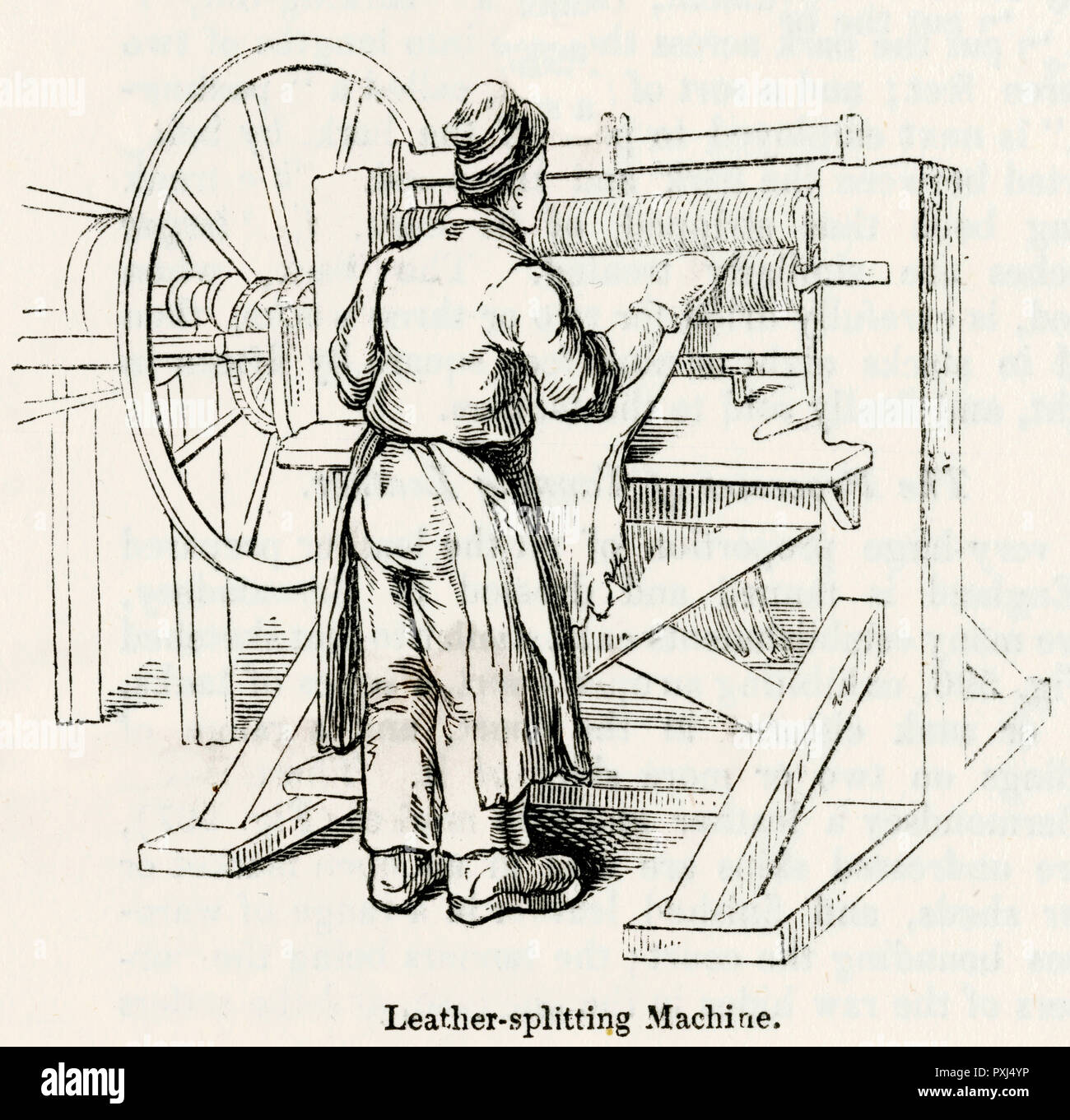 Leather splitting machine at a leather factory, south London Stock ...