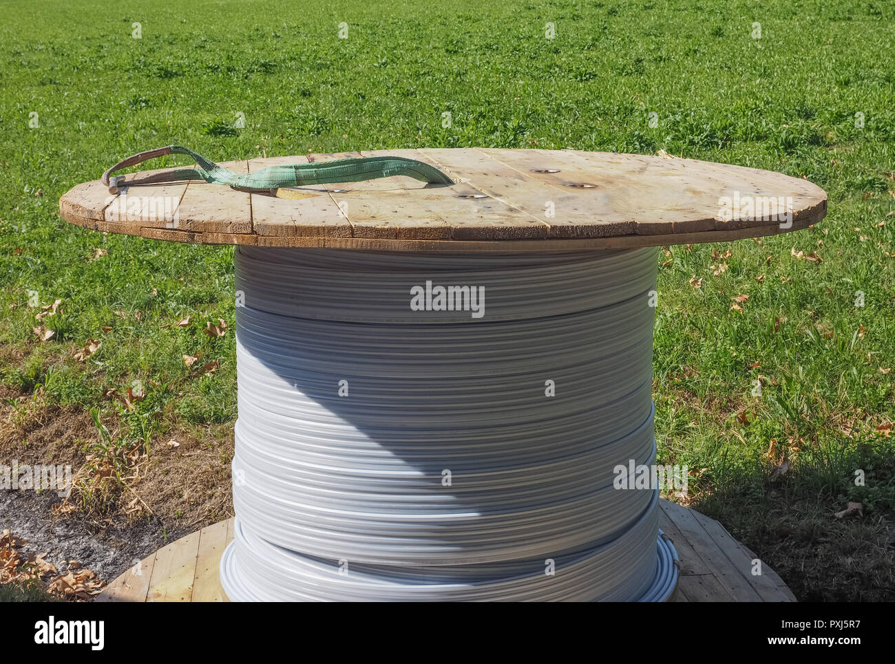 spool of fiber optics cable pipes for FTTH (Fibre to the home Stock ...