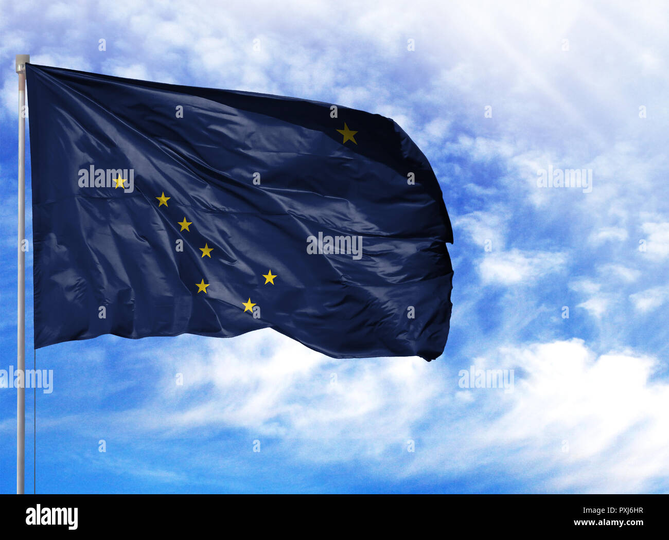 flag State of Alaska on a flagpole in front of blue sky Stock Photo - Alamy