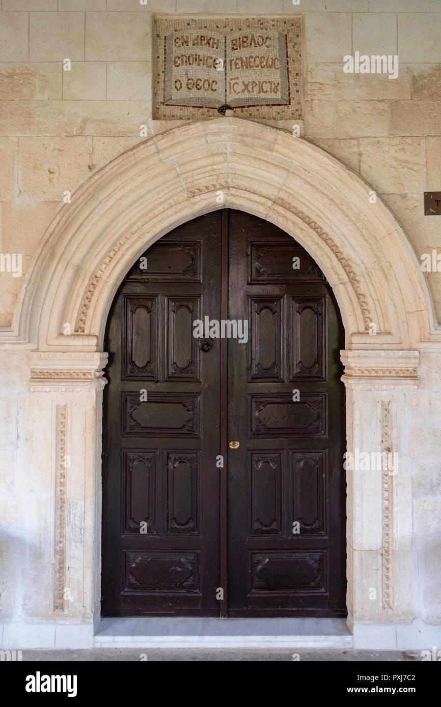 Ornate wooden entrance door at Agios Neophytos Monastery near Tala ...