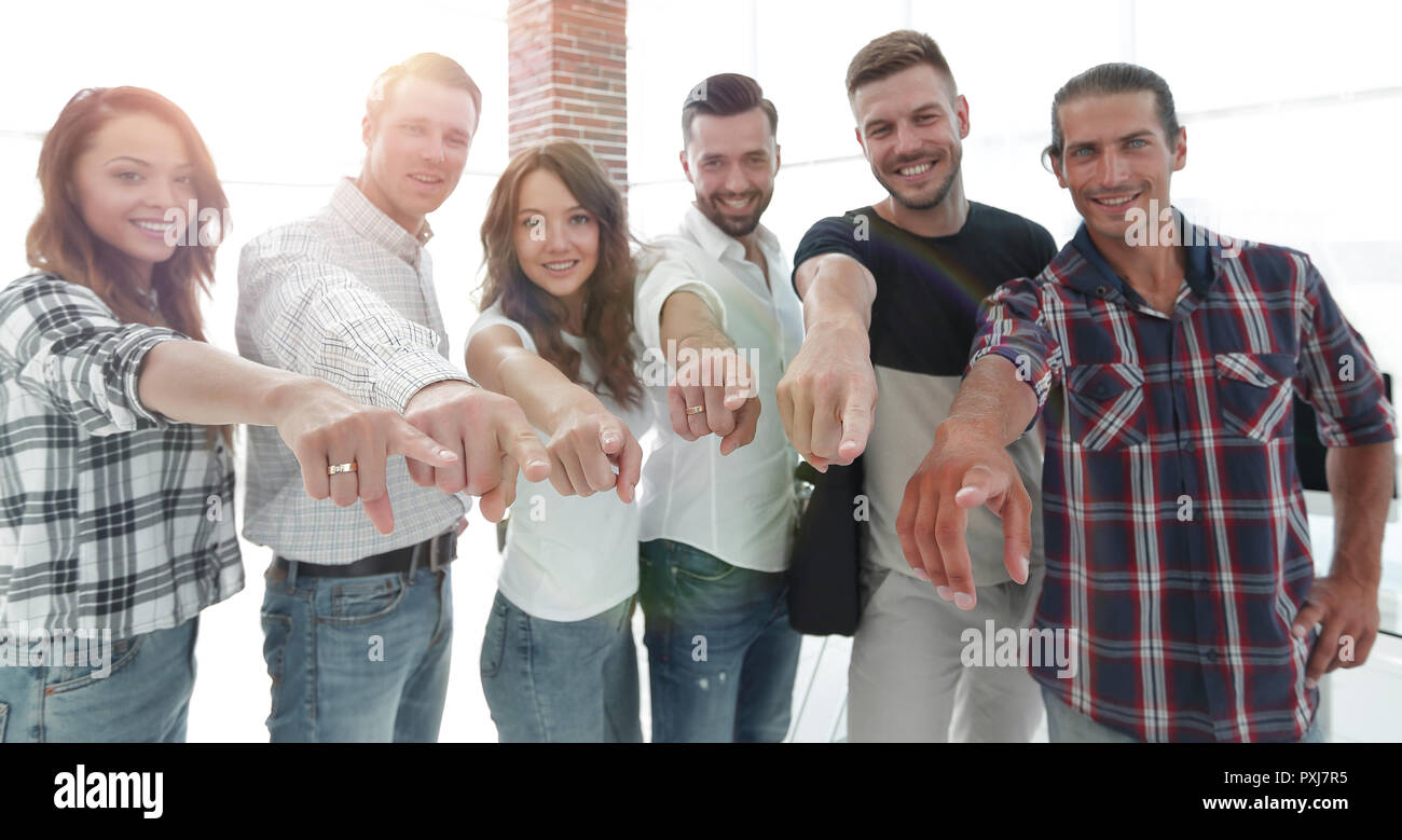members of the business team pointing his arms forward.the concept of ...