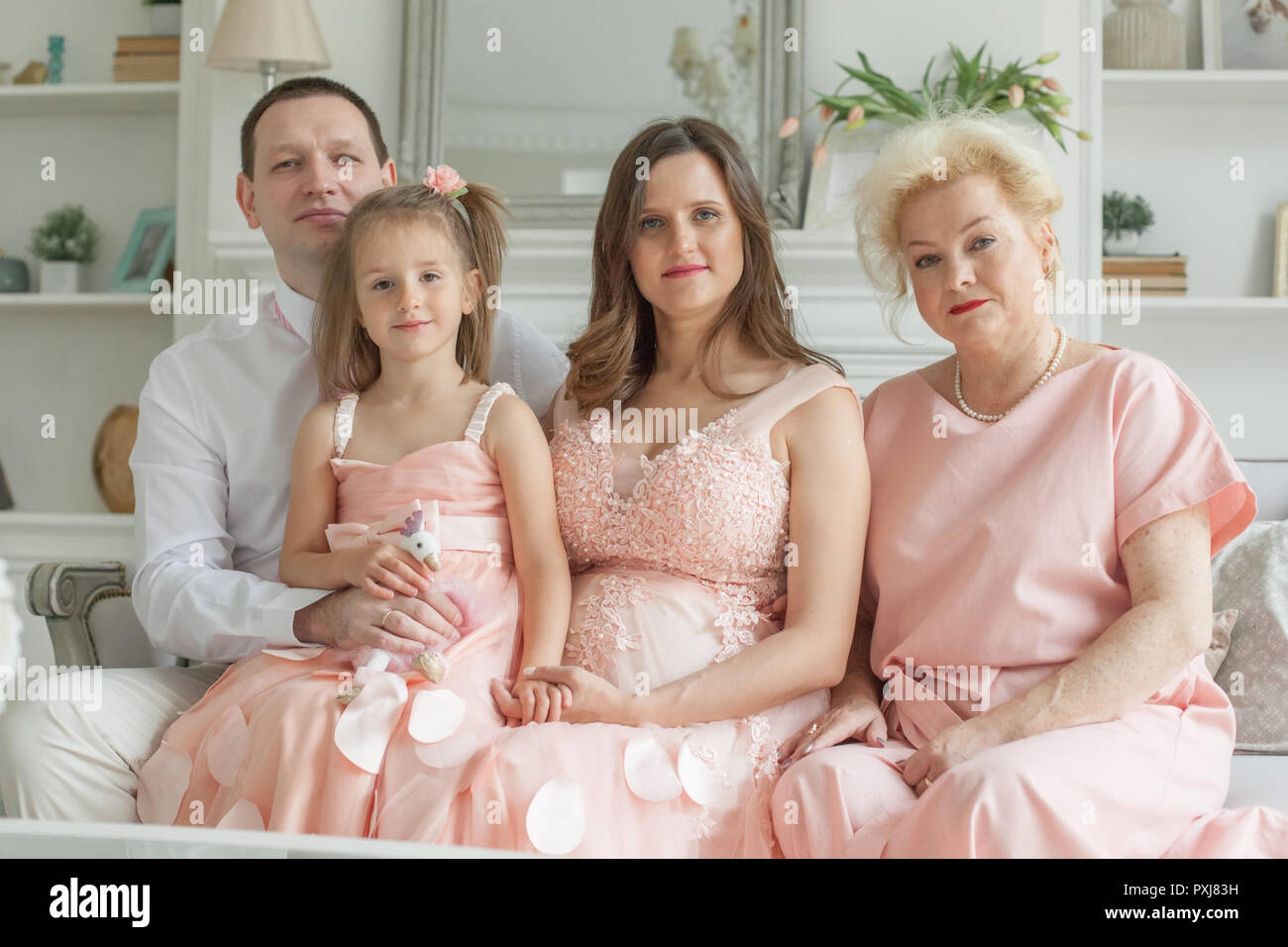 Family generation. Grandmother and mother, daughter, father. Older ...