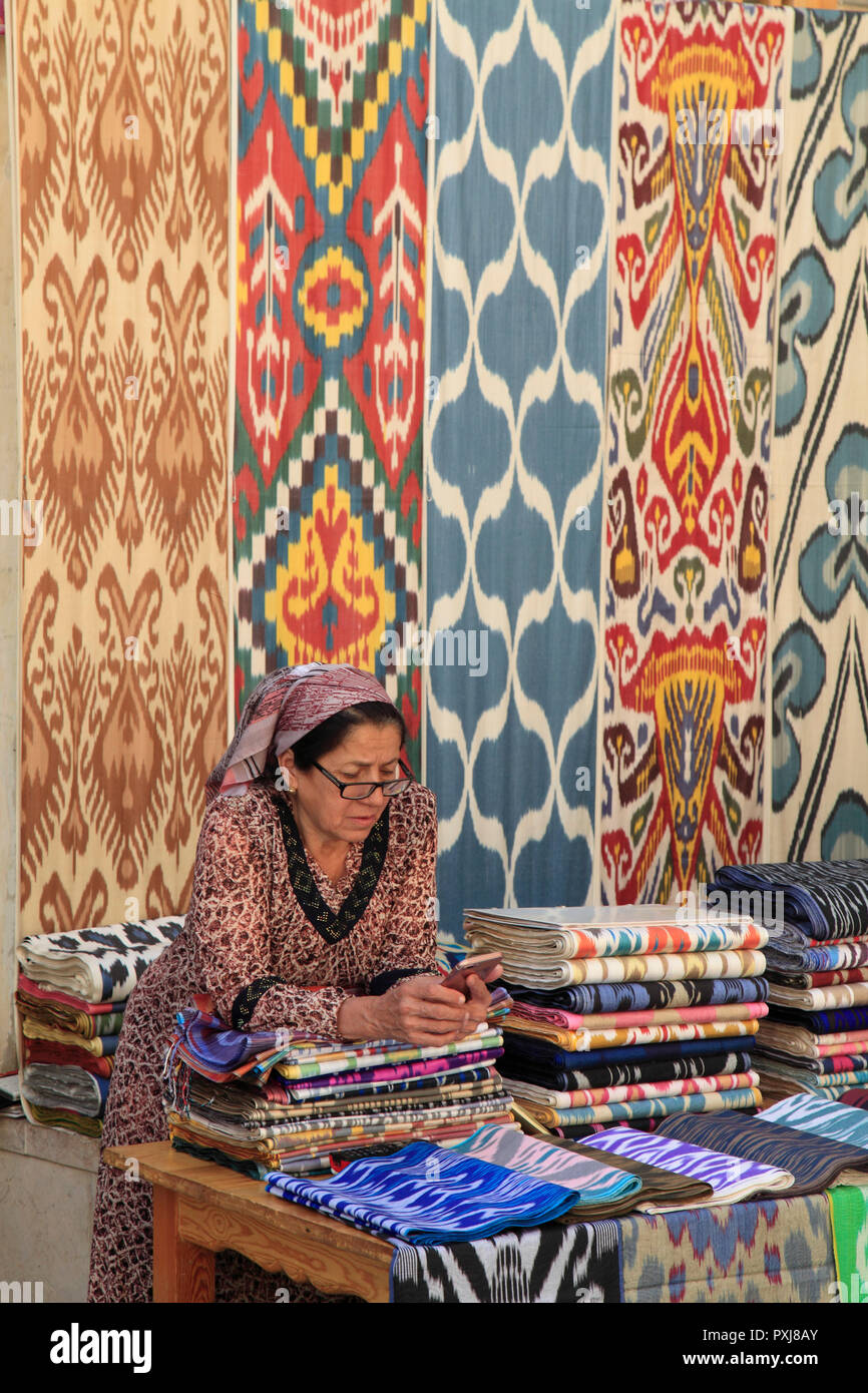 Uzbekistan; Bukhara; textiles shop, vendor Stock Photo - Alamy