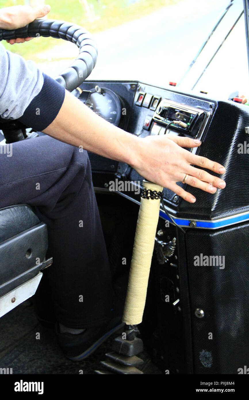 Driver driving bus. Profession driver of bus. Dashboard in bus Stock ...