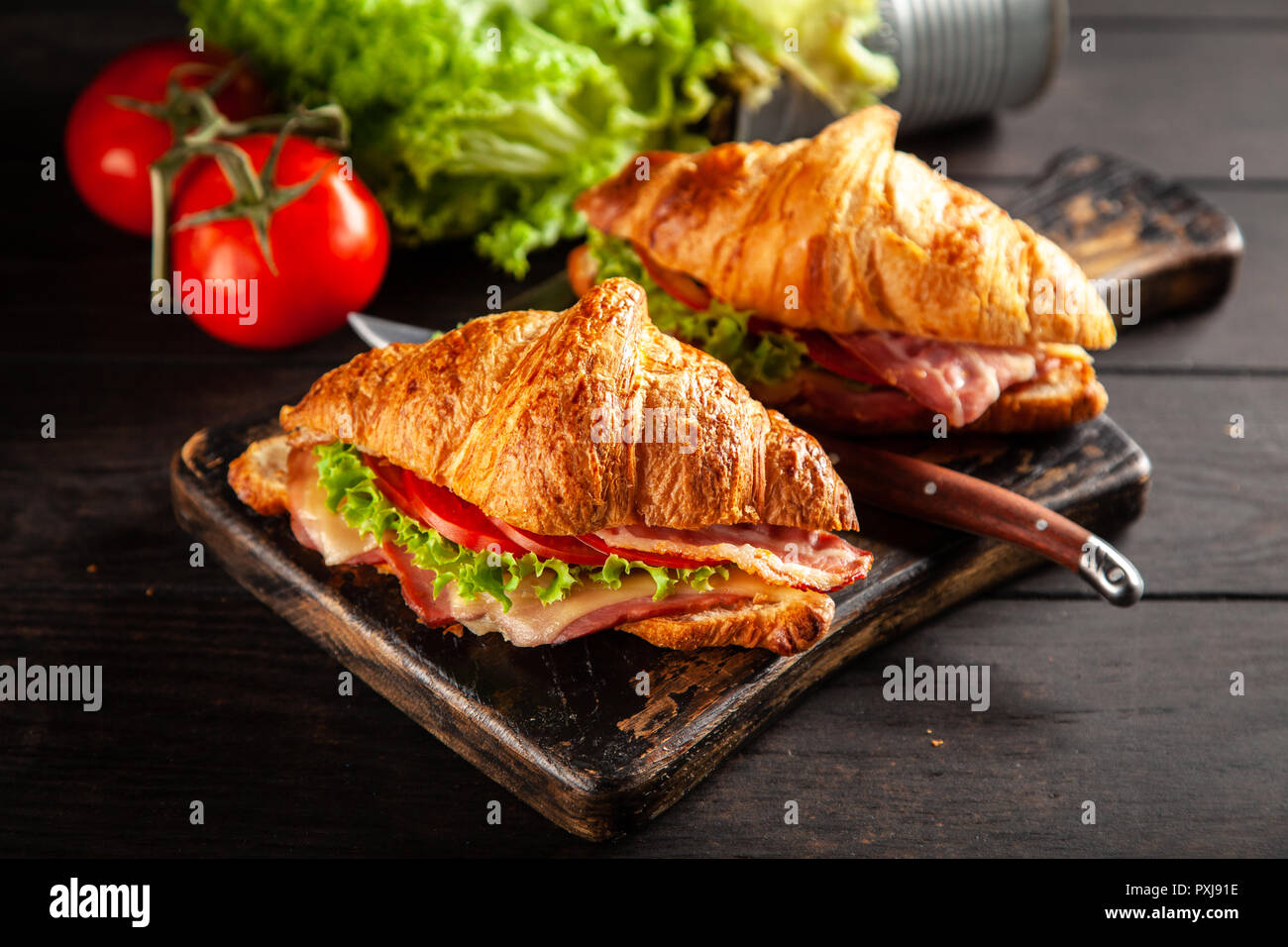 Classic BLT croissant sandwiches on dark background Stock Photo - Alamy