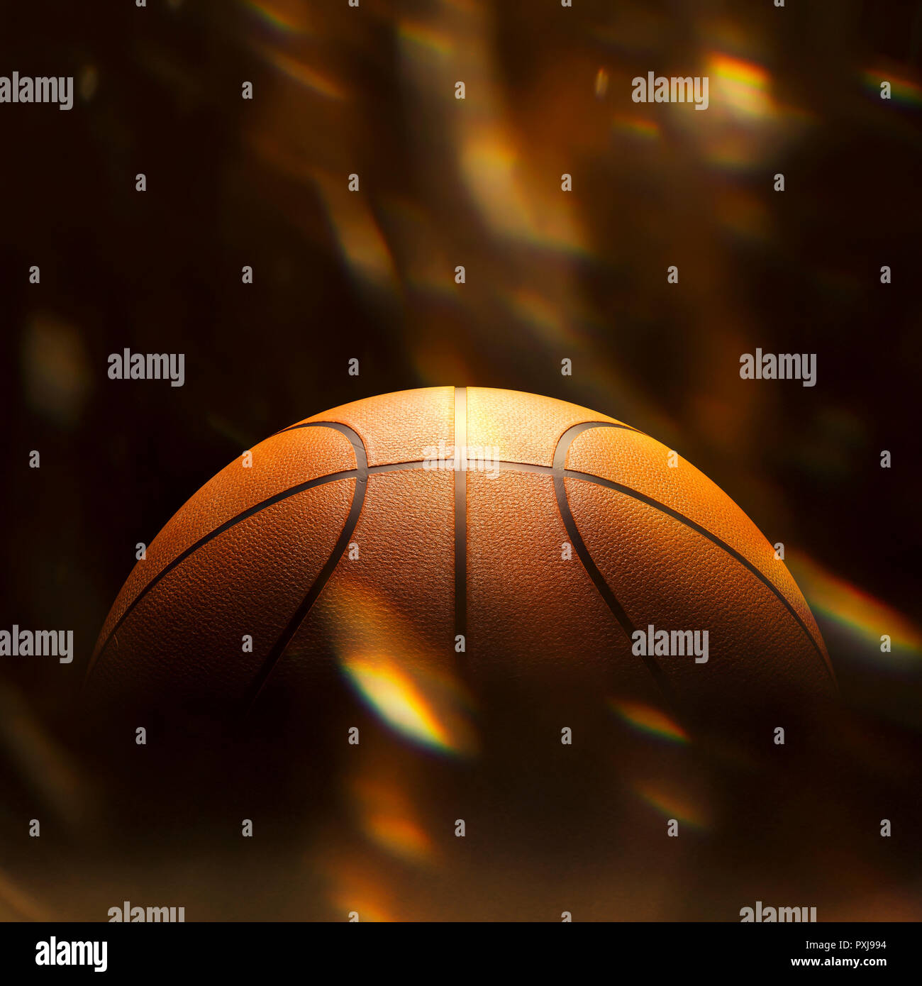 Basketball close-up on black background with bokeh, spotlights and fire ...