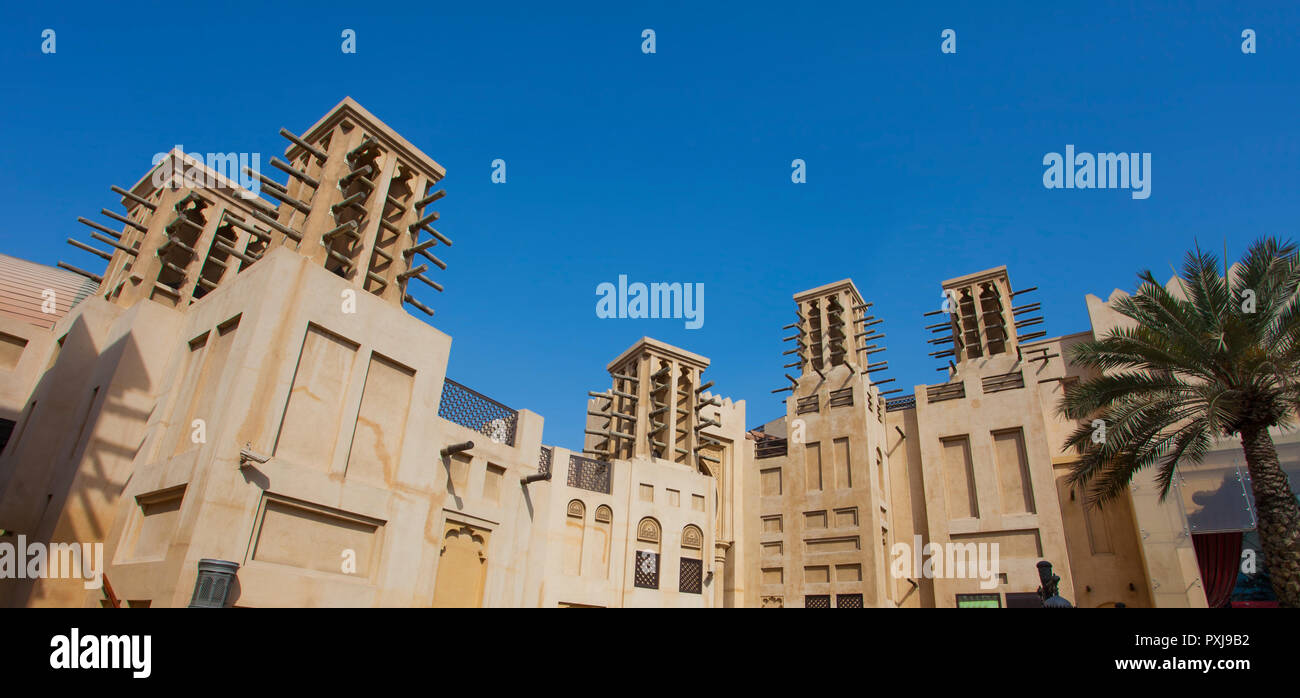 traditional Arab wind tower for air conditioning and cooling on top of ...