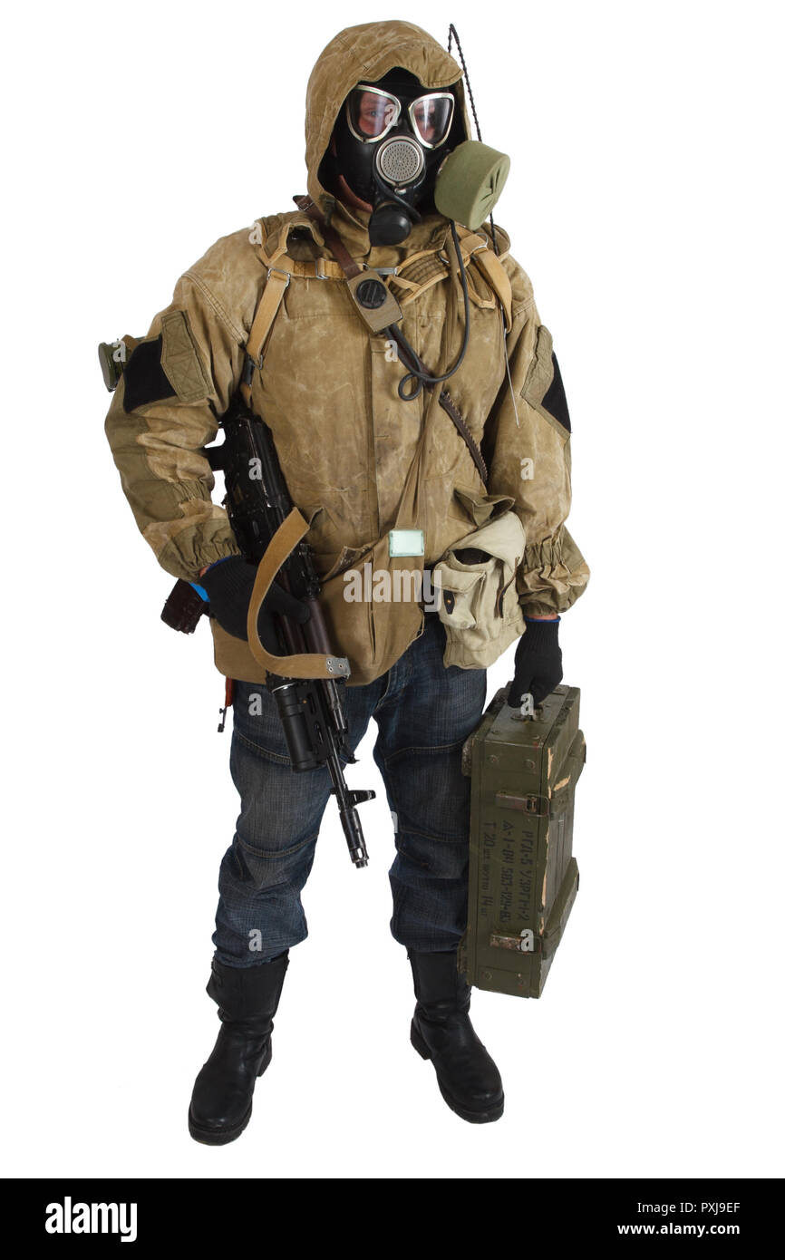 Post-apocalyptic fiction concept - stalker in gas mask with weapon and ...