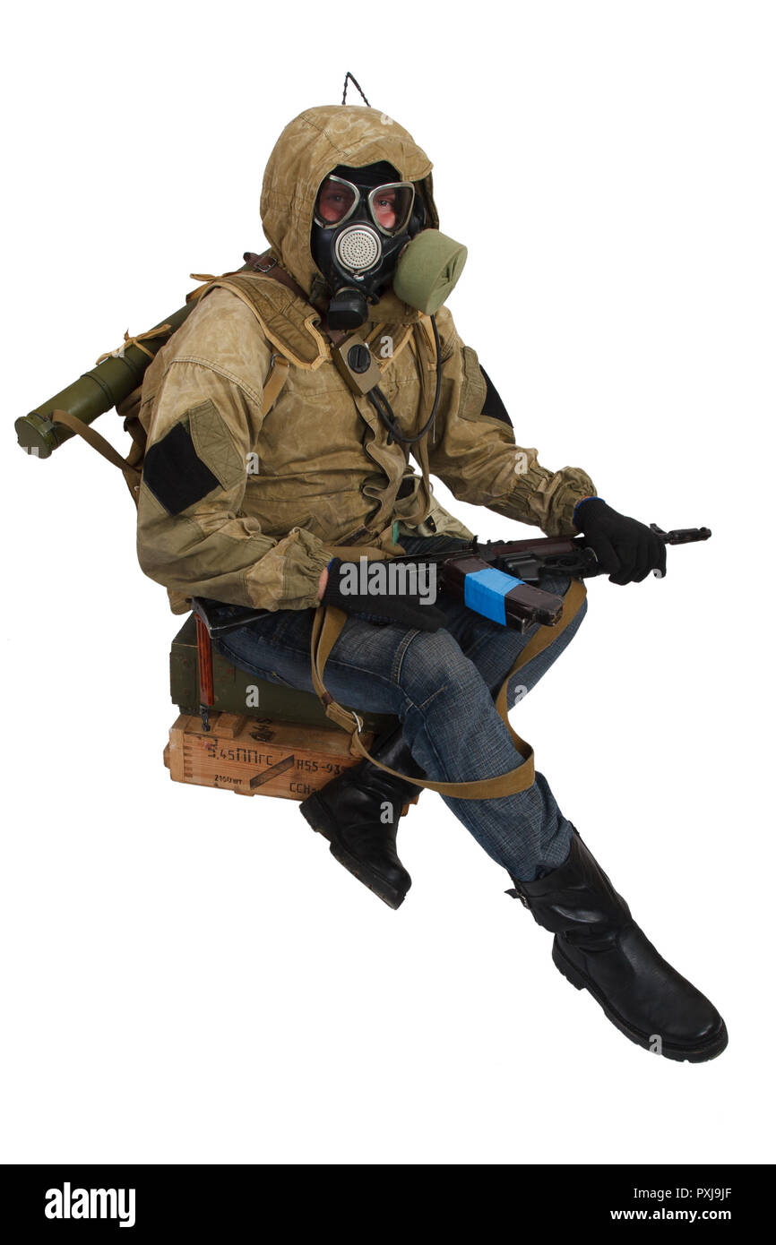 Post-apocalyptic fiction concept - stalker in gas mask with weapon and ...
