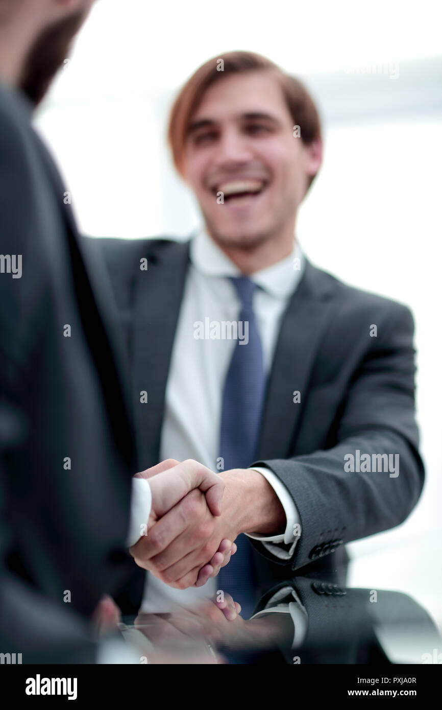 vertical photo.handshake business people .close up Stock Photo - Alamy