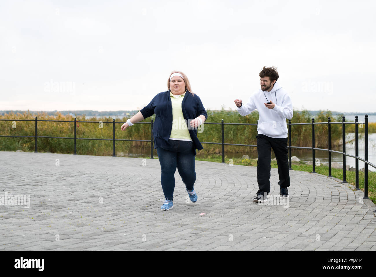 Fat woman running hi-res stock photography and images - Alamy