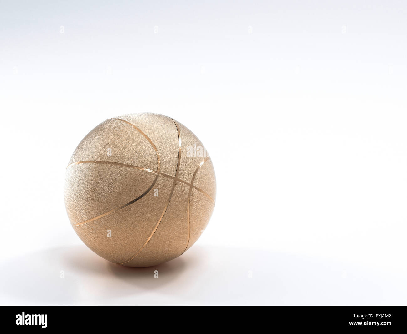 Gold metalic Basketball close-up on bright studio background Stock ...