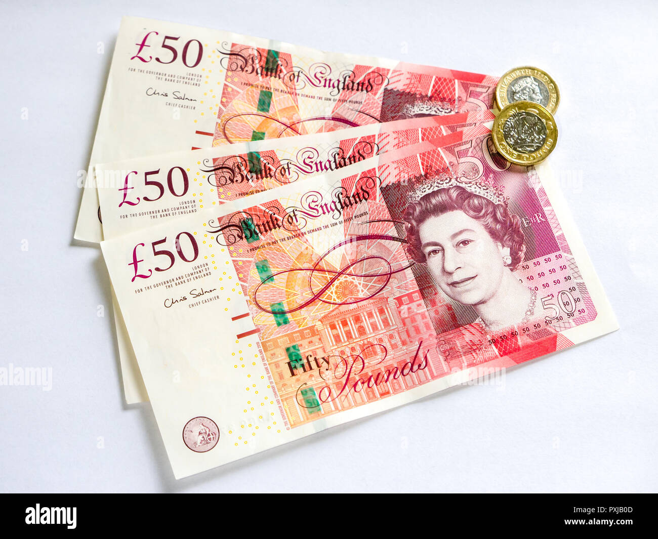New british 50 pounds and coins isolated on white background Stock ...