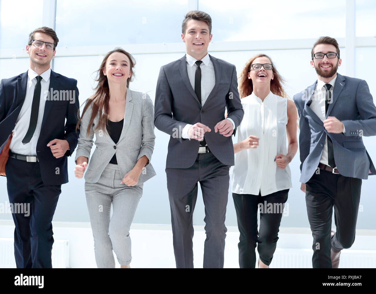 in full growth. professional business team stepping together Stock ...