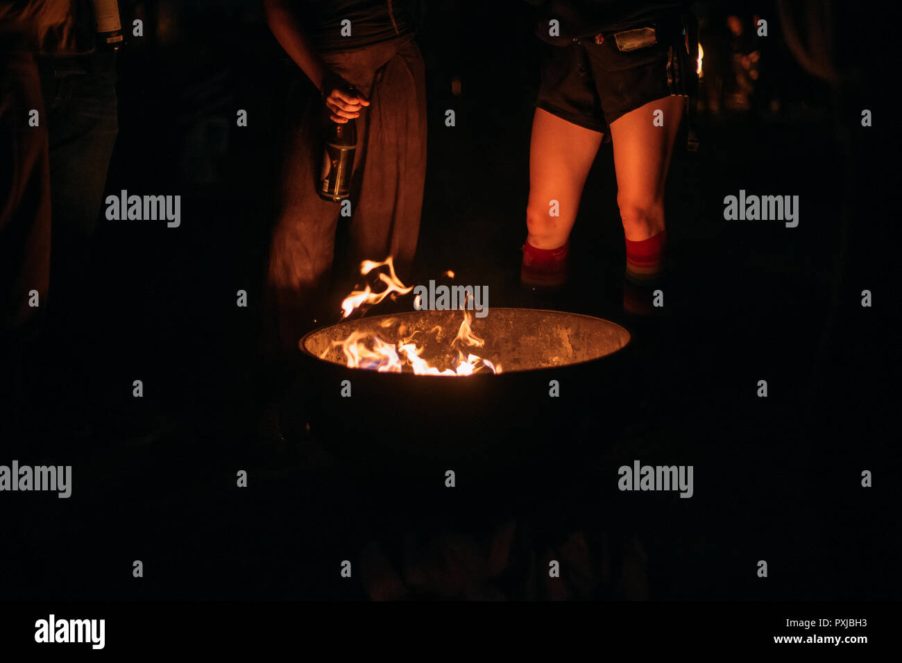 People Around A Bonfire High Resolution Stock Photography and Images ...
