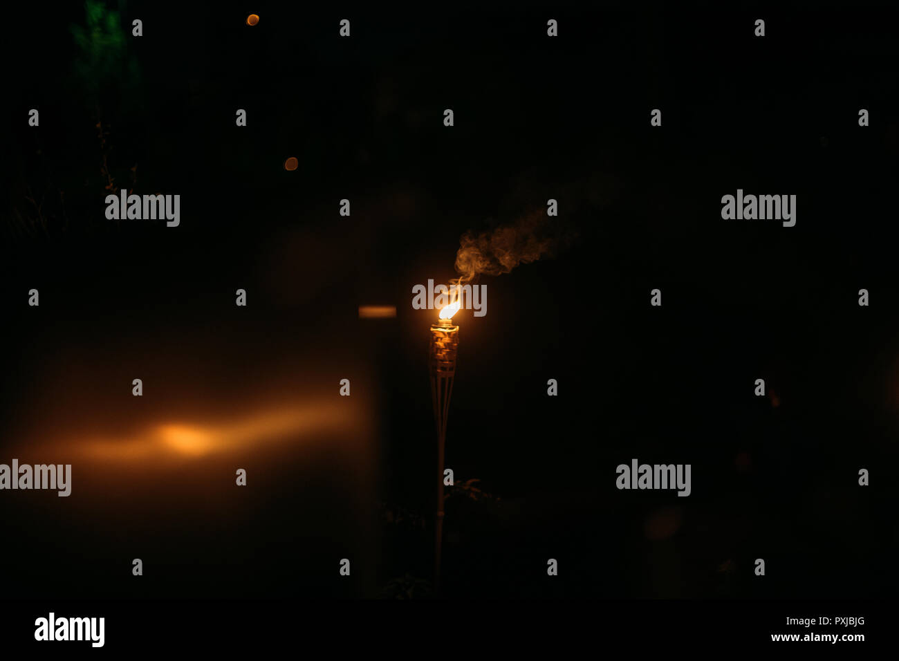 Tiki torch at night hi-res stock photography and images - Alamy