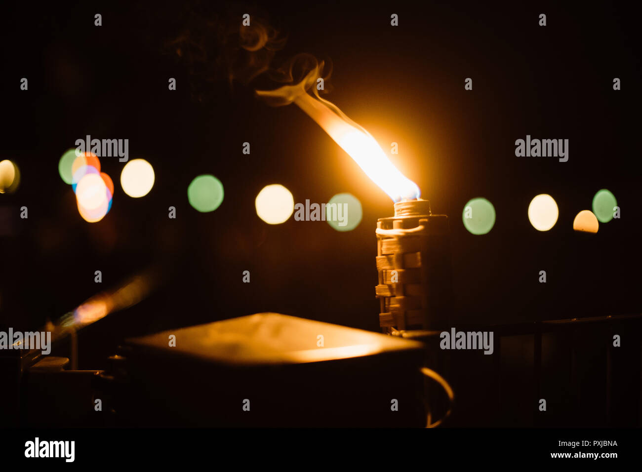 Tiki torch at night hi-res stock photography and images - Alamy