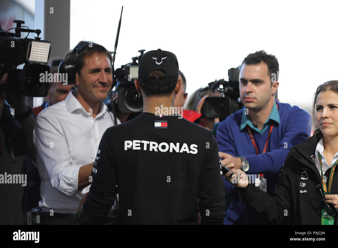 Lewis Hamilton from the back in front of TV and Radio for an interview ...