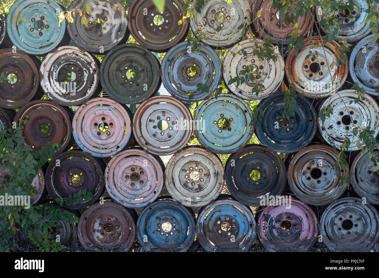 wall of automotive rims Stock Photo - Alamy