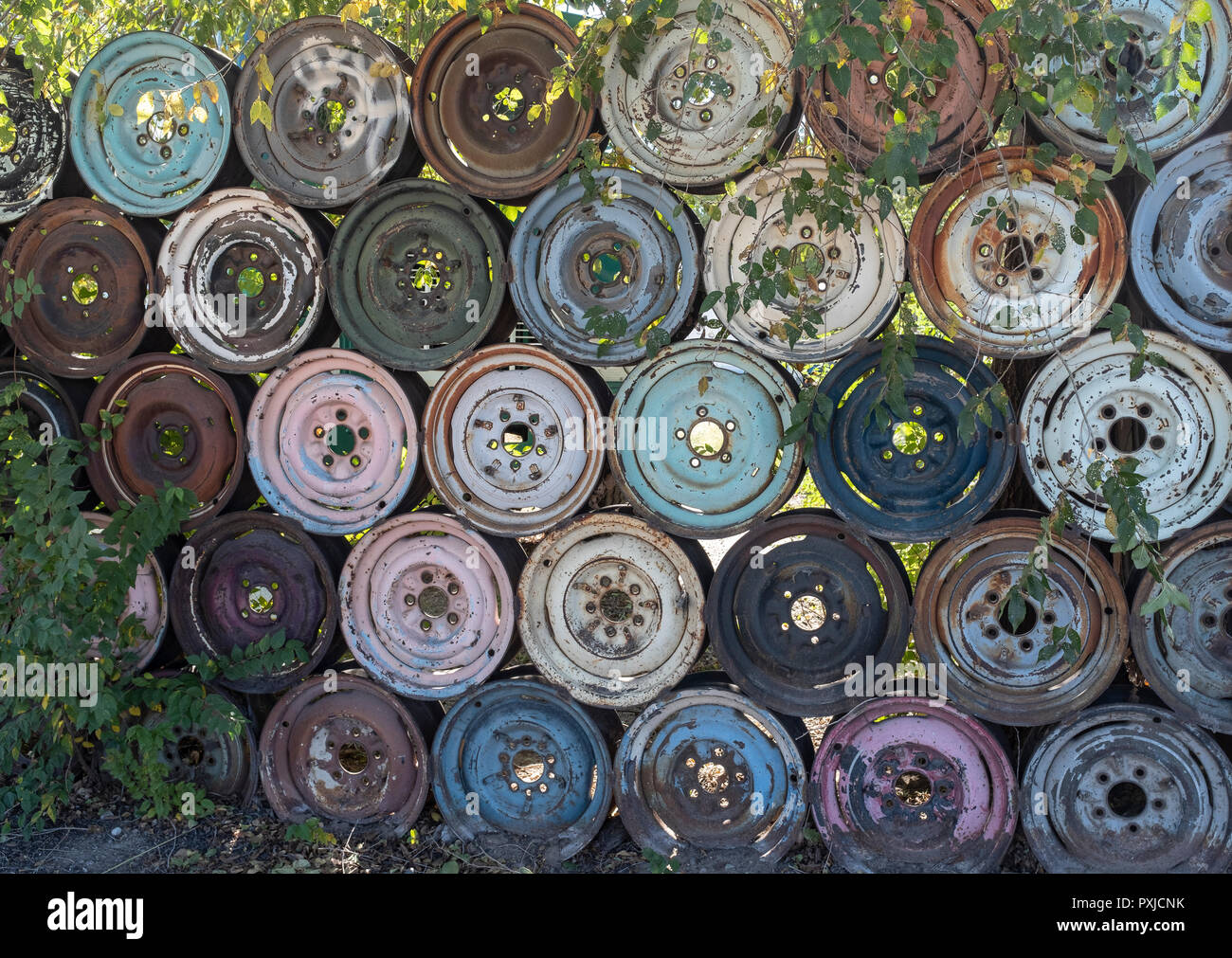 wall of automotive rims Stock Photo - Alamy