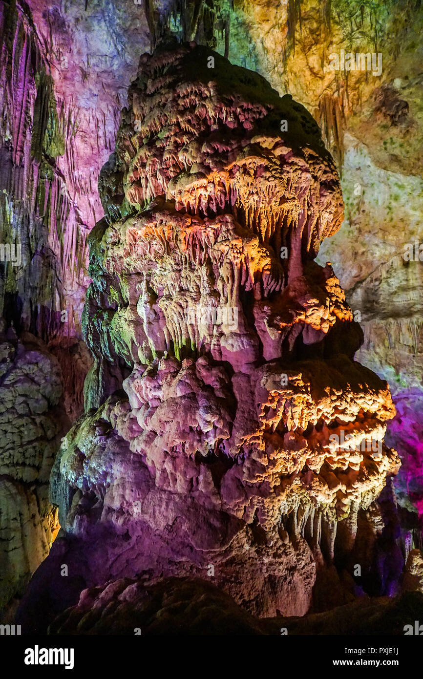 Stalactites Interior View of Prometheus Cave with Pink Lights Stock ...