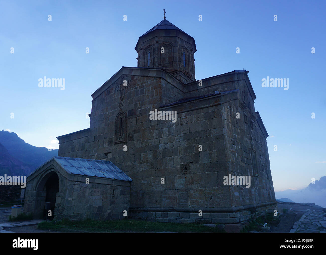 Stepantsminda Gergeti Church Full View with Blue Sky at Evening Stock ...