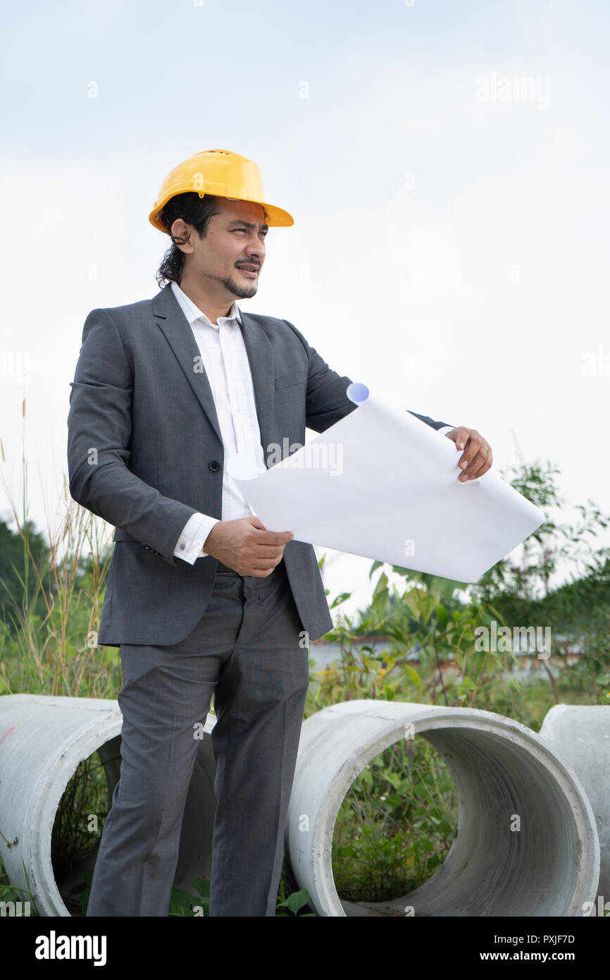 arab engineer with blueprints Stock Photo - Alamy
