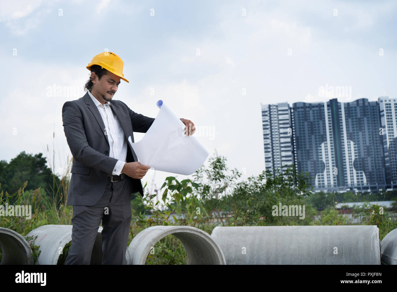 arab engineer with blueprints Stock Photo - Alamy