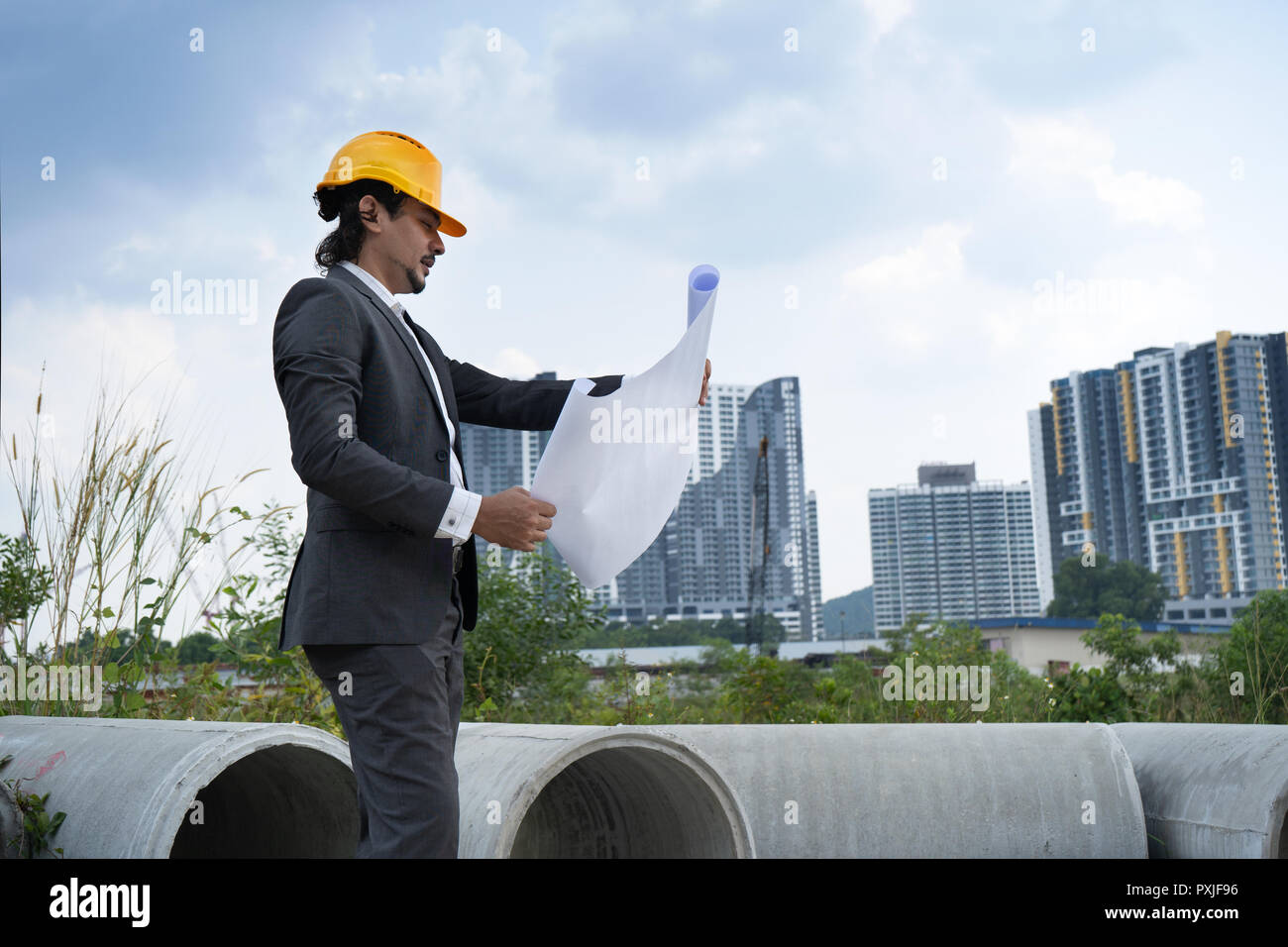 arab engineer with blueprints Stock Photo - Alamy