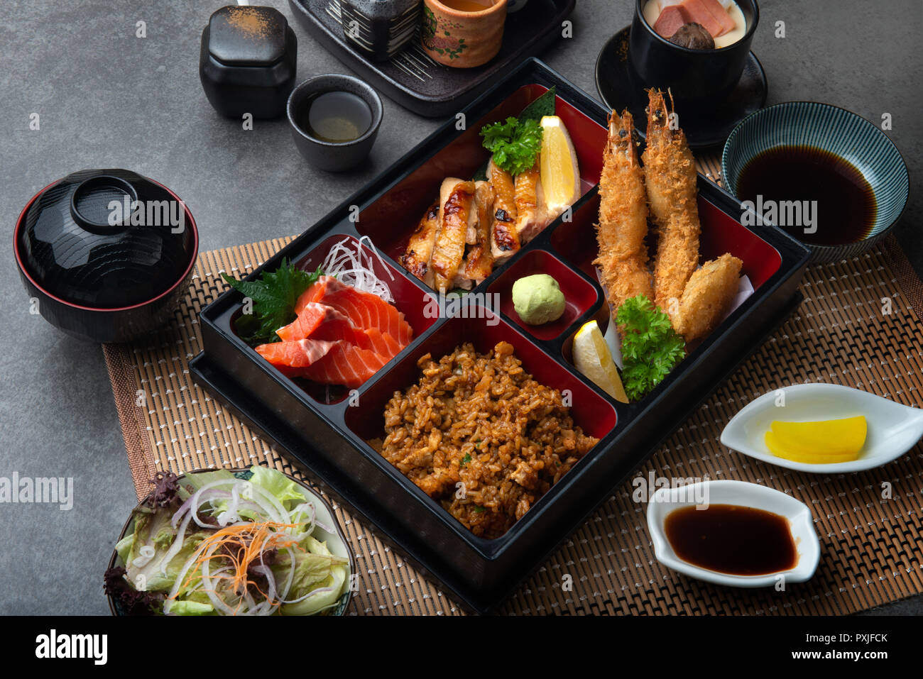japanese bento set with dark background Stock Photo - Alamy