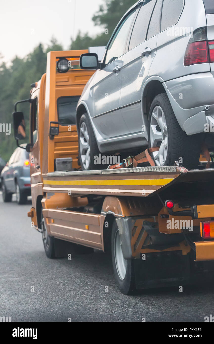 help on road transports wrecker broken car Stock Photo - Alamy