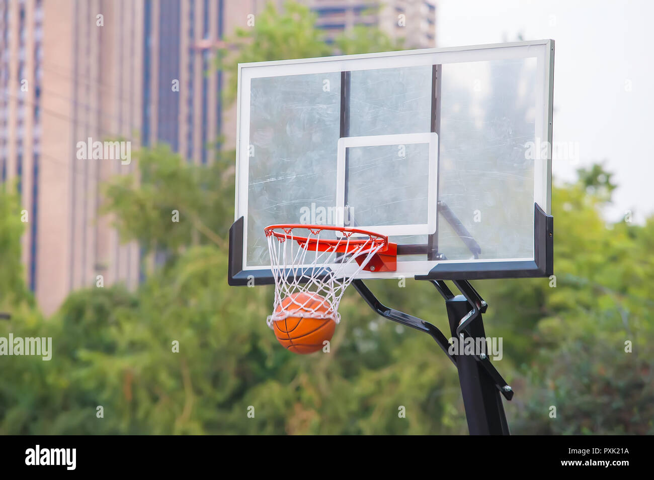 With a basketball ball hi-res stock photography and images - Alamy