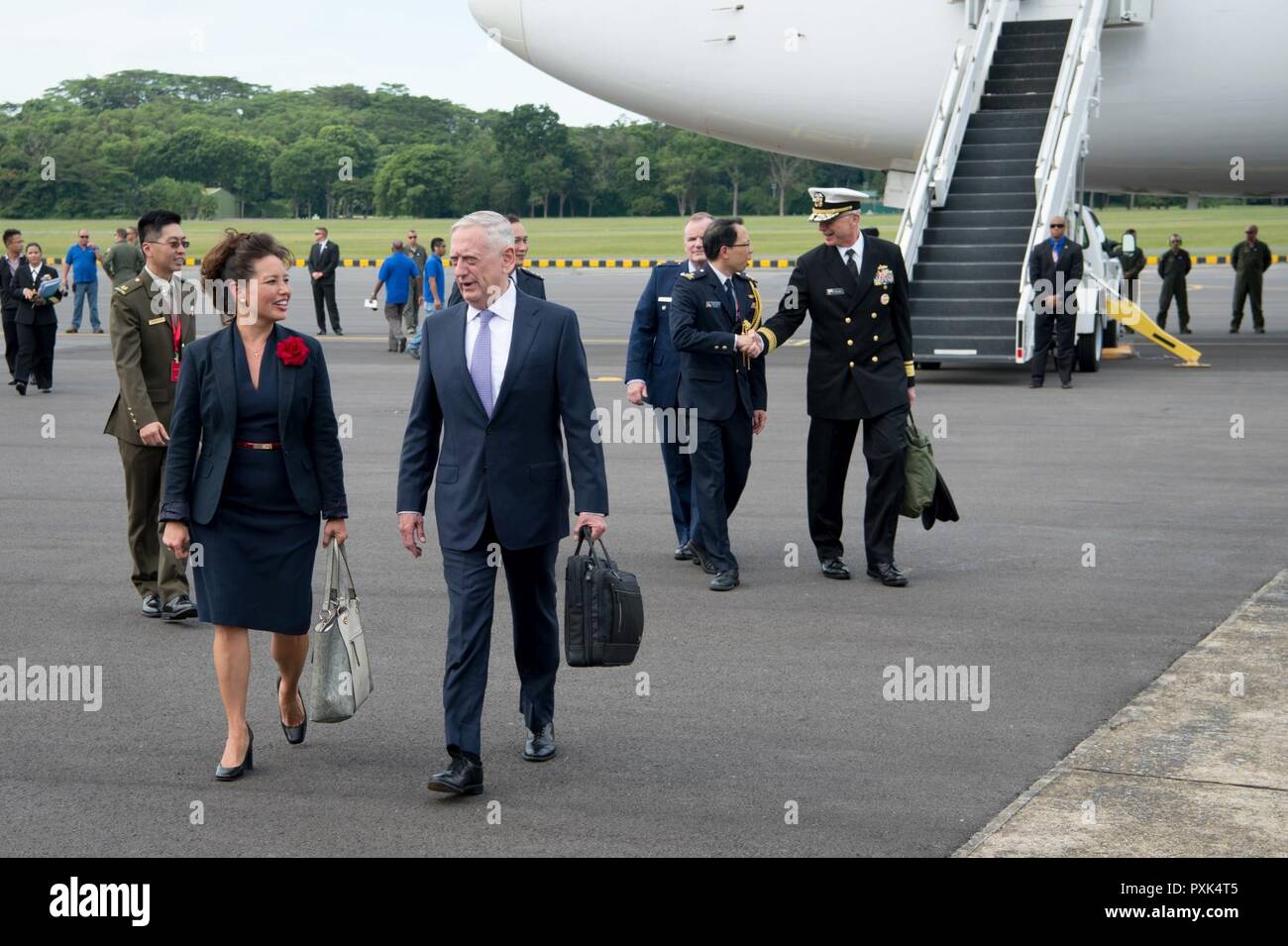 Secretary of Defense Jim Mattis is met by Chargé d’Affaires Stephanie ...