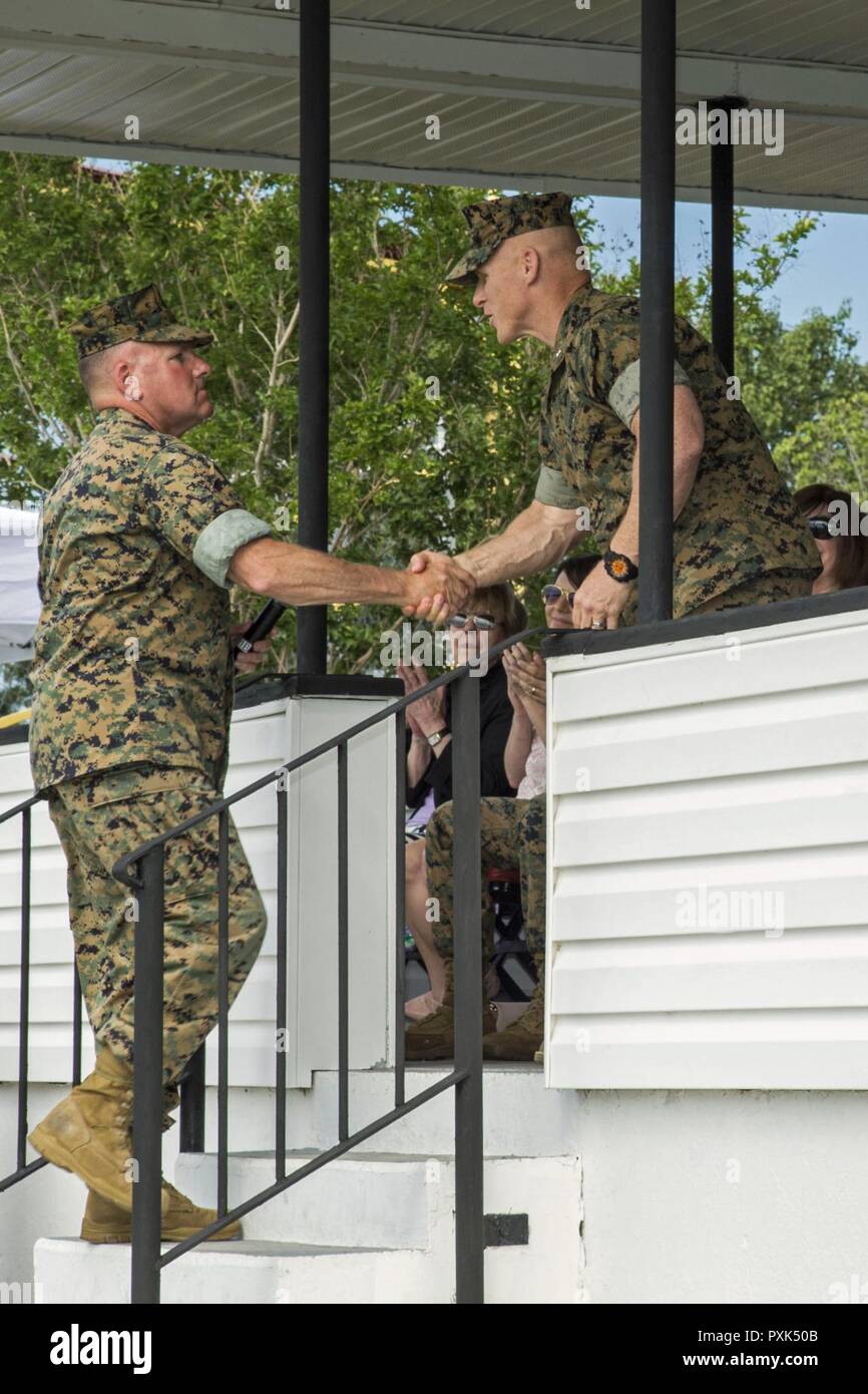 U.S. Marine Corps Maj. Gen. John J. Broadmeadow, left, commander ...