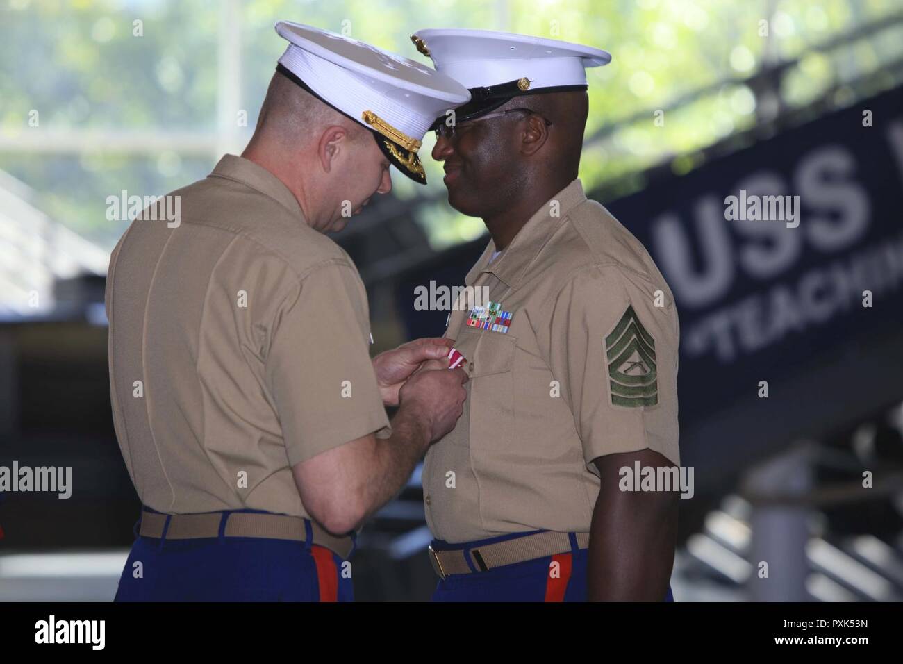 Master Sgt. David Roberts, now officially retired, receives an award ...