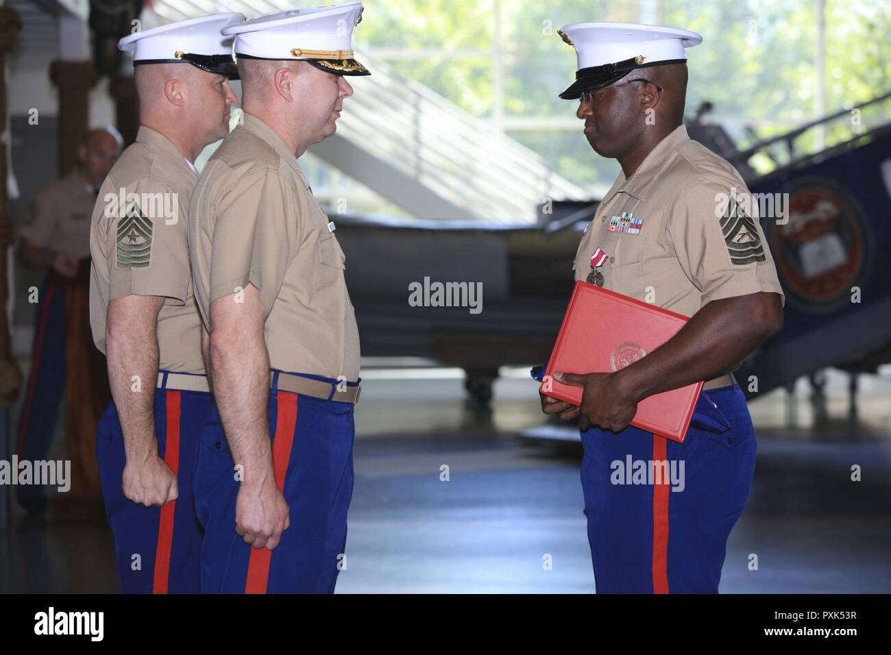 Master Sgt. David Roberts, now officially retired, receives an award ...