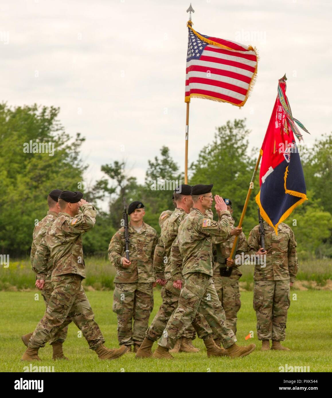 The reveiwing party salutes the 1st Brigade Combat Team, 10th Mountain ...