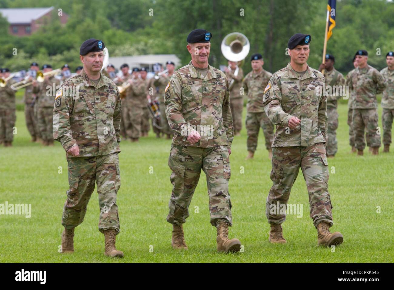 From left are Col. Shane Morgan, incoming commander of 1st Brigade ...