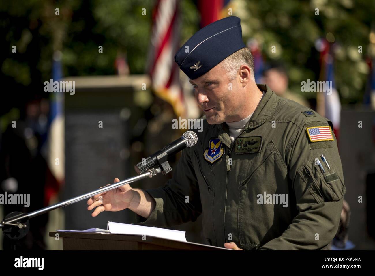 U.S. Air Force Col. Jack Aalborg, Air Attaché to France, gives a speech ...