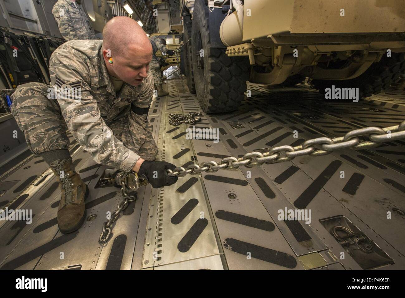 U.S. Air Force Aerial Porter Senior Airman Christopher E. Pavlik with ...