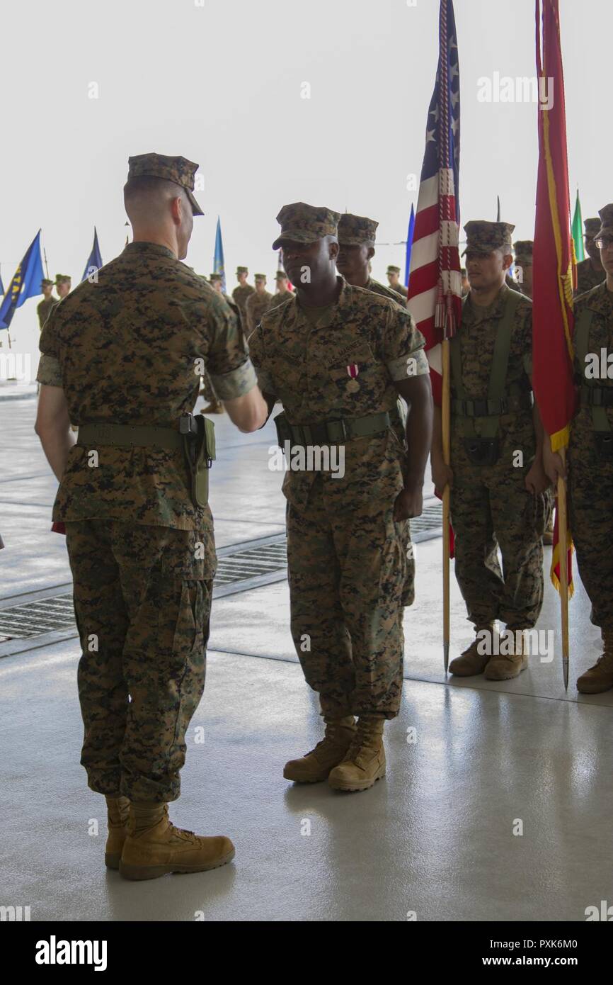U.S. Marine Corps Lt. Col. Kevin A. Campbell, left, commanding officer ...